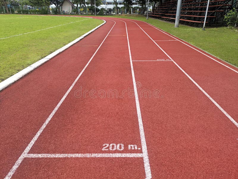 The Running Track Inside a Football Stadium is Usually a Circular ...