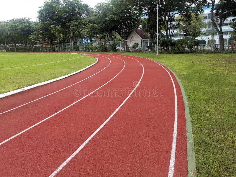The Running Track Inside a Football Stadium is Usually a Circular ...