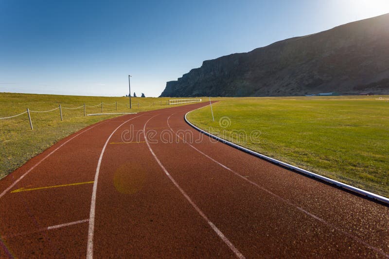 Running track outdoors stock image. Image of arena, ground - 70411527
