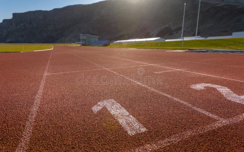 Running track outdoors stock image. Image of numbers - 71825445