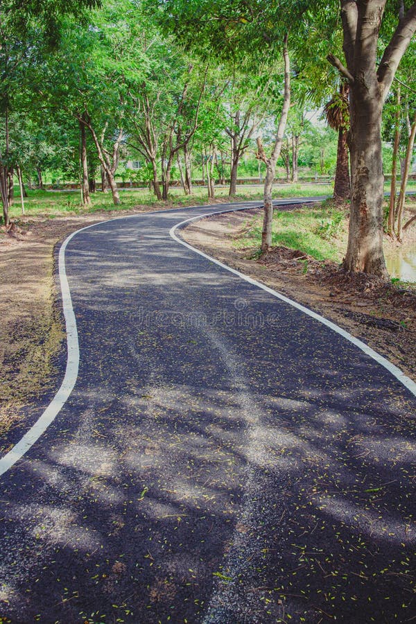 Running track in the park stock image. Image of park - 250250447