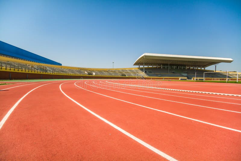 Running track in stadium stock photo. Image of health - 104552398