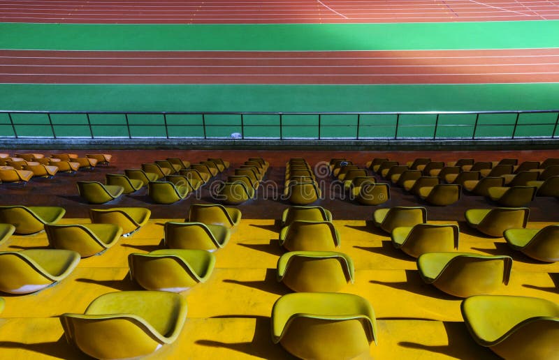 Running Track and Stadium Seats at Night Stock Image - Image of bench ...