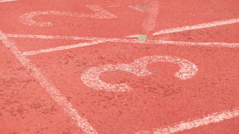 Running Track, Starting Line Numbers. Panning Shot of Athletics Track ...