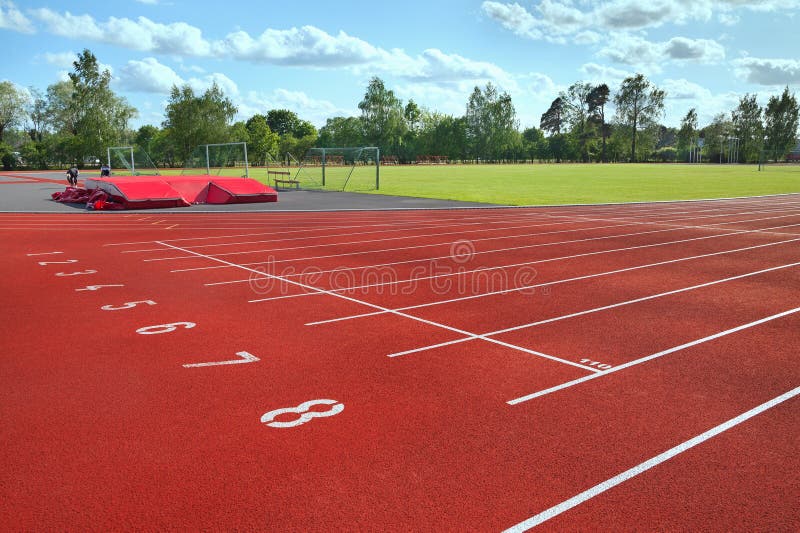 Running tracks on stadium stock photo. Image of stadium - 161861568