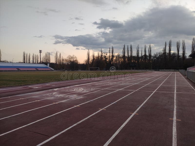 Running Tracks in the Stadium in Evening in Winter Stock Photo - Image ...