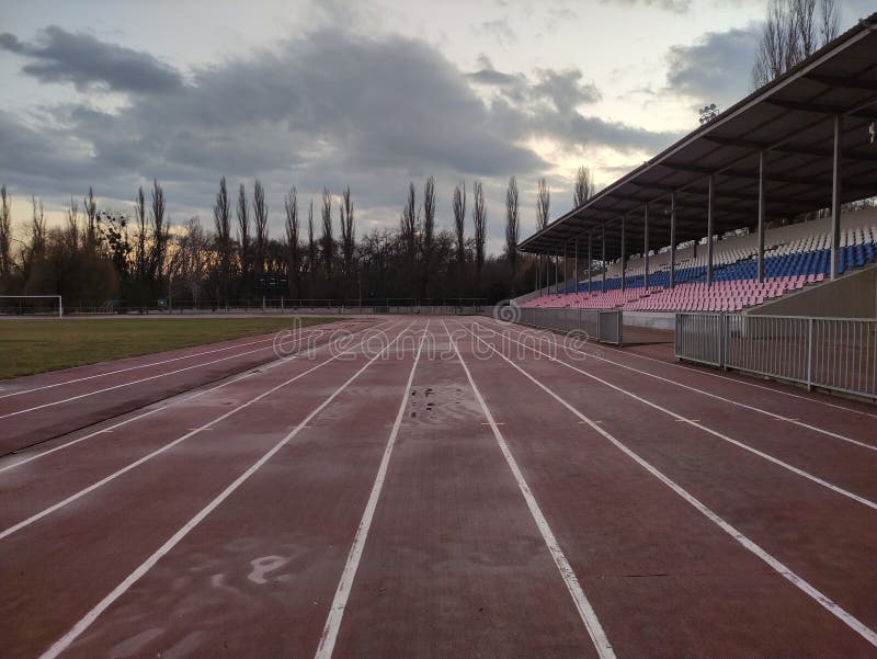 Running Tracks in the Stadium in Evening in Winter Stock Photo - Image ...