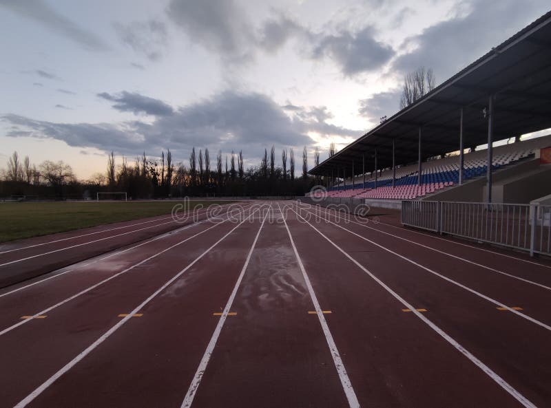 Running Tracks in the Stadium in Evening in Winter Stock Photo - Image ...