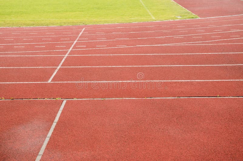 Running tracks in stadium stock photo. Image of field - 319072026