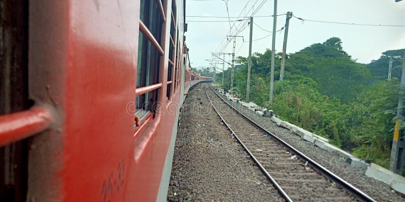 Running Train with Another Rail Track on Side with Green Trees and ...