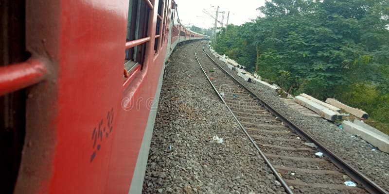 Running Train with Another Rail Track on Side with Green Trees and ...