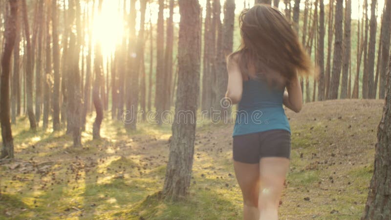Girl Running in Woods stock video. Video of lifestyle - 87339621