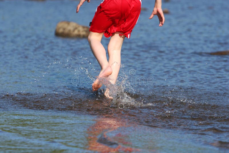Running on water stock image. Image of summer, young, happy - 1090313
