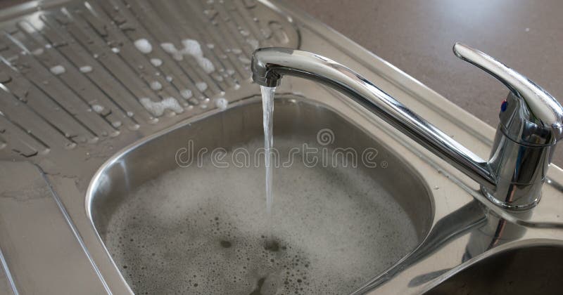 Running Water Over Kitchen Sink. Stock Image - Image of suds, stainless ...