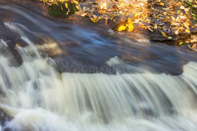 Running water in a stream stock image. Image of fall - 227640599