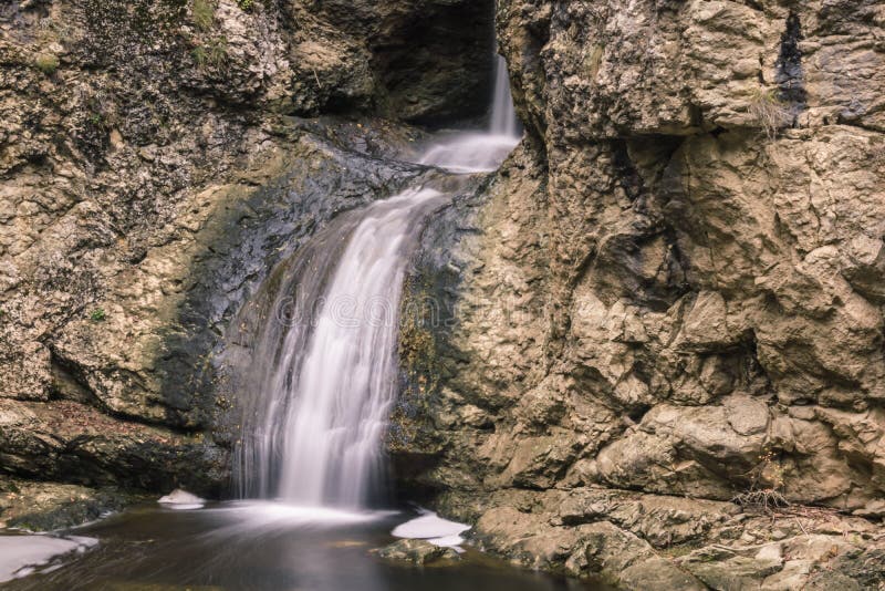Running waterfall and ice stock image. Image of melting - 24832419