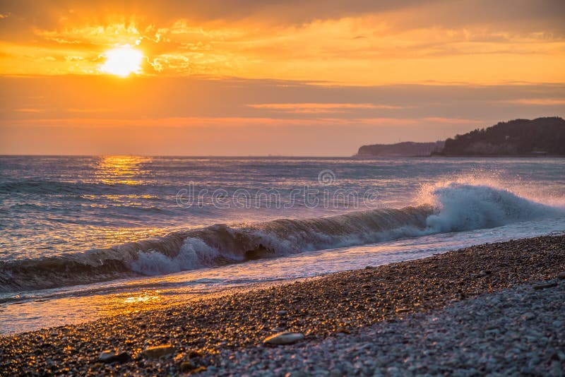 Running Wave on the Beach at Sunset Stock Image - Image of running ...