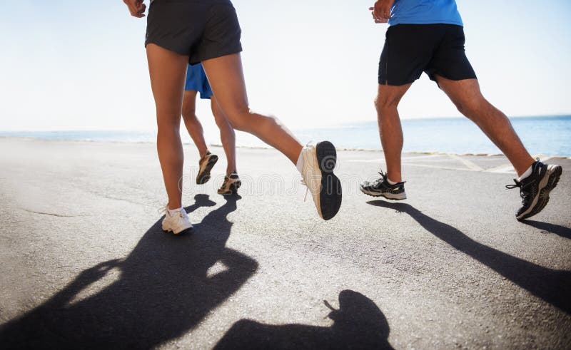 Running is a Way of Life. Low Angle View of a Runner Next To the Ocean ...
