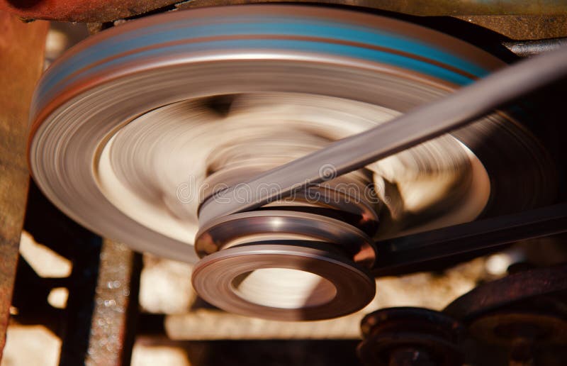 A Running Wheels of a Motor with Belts Photo Stock Photo - Image of ...