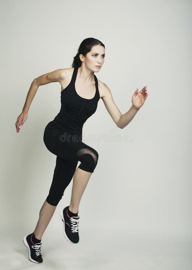 Running Young Beauty Woman Isolated Studio Shot Stock Photo - Image of ...