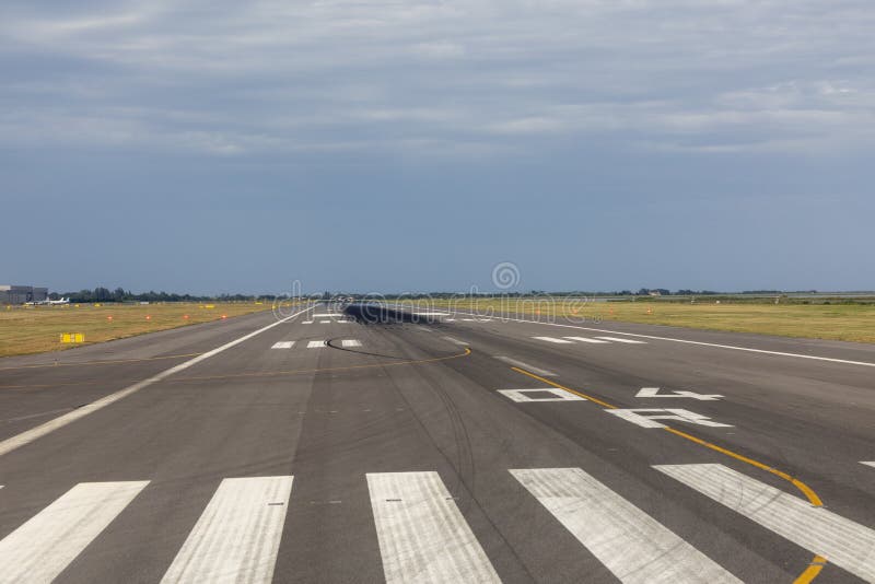 Runway of Airport with Cloudy Sky Stock Photo - Image of flying, venice ...