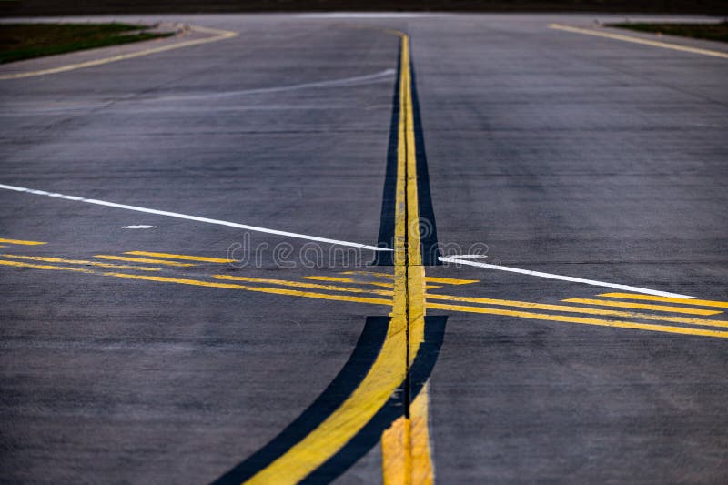 Runway at the airport stock image. Image of stripes - 248606293