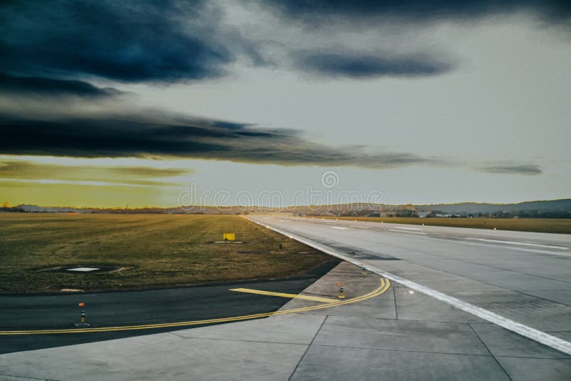 The Runway is Covered with a Beautiful Dark Sky Stock Photo - Image of ...