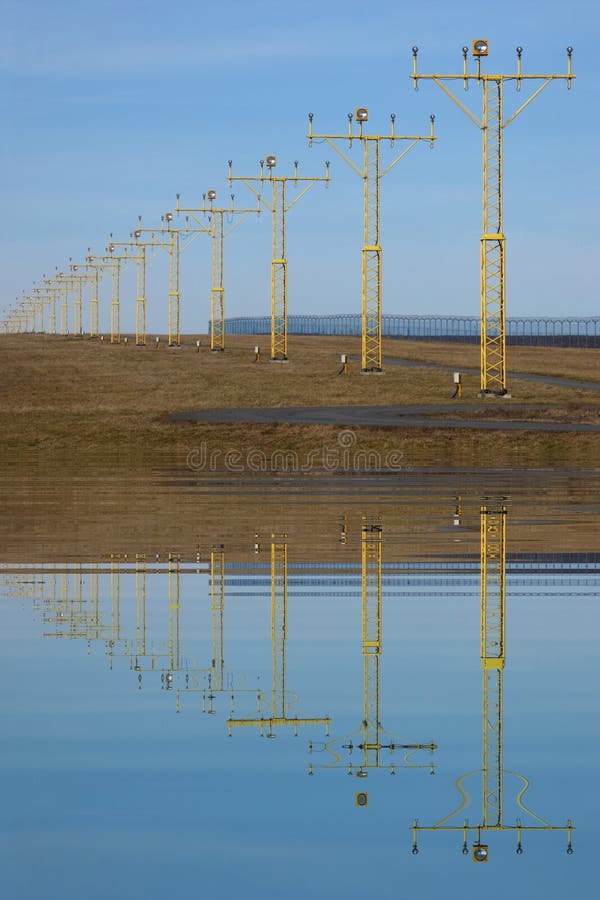Runway Lights with Water Refections Stock Image - Image of airport ...