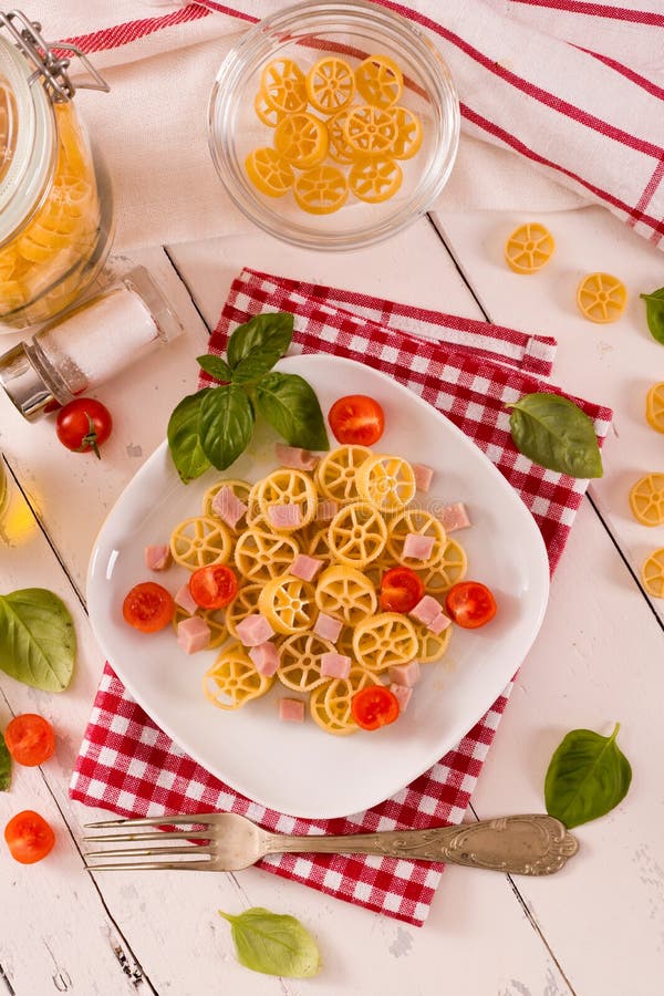Ruote Pasta with Tomato and Ham. Stock Photo - Image of freshness ...