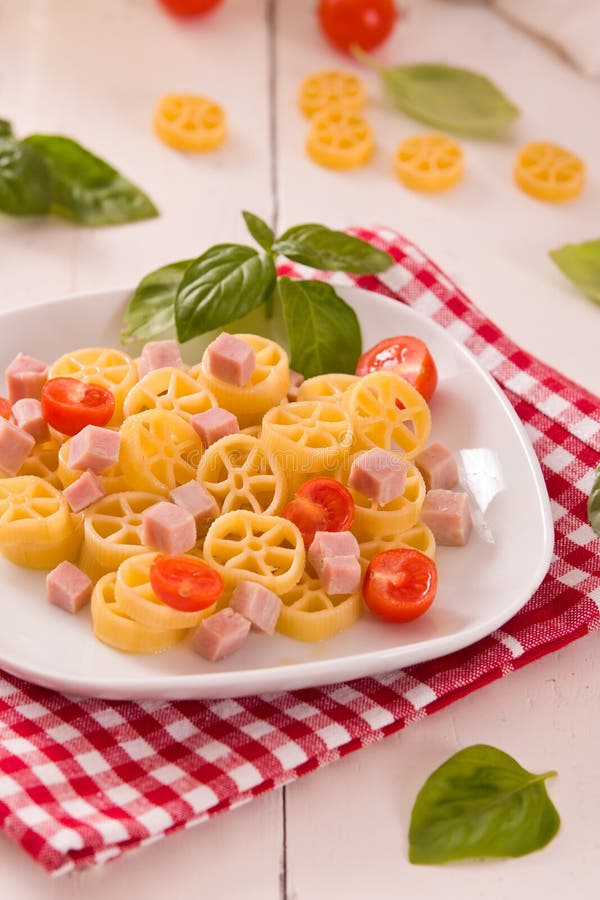 Ruote Pasta with Tomato and Ham. Stock Photo - Image of herb, dinner ...