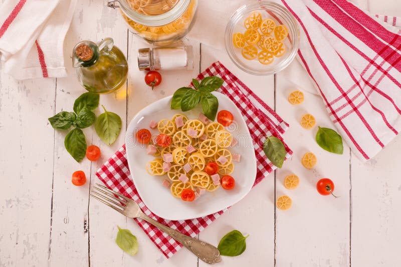Ruote Pasta with Tomato and Ham. Stock Photo - Image of leaf, appetizer ...