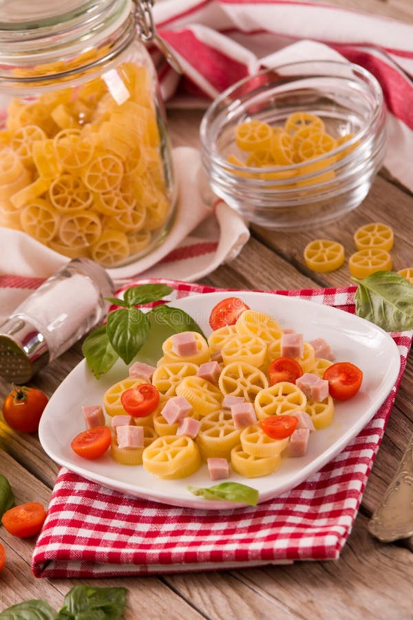 Ruote Pasta with Tomato and Ham. Stock Photo - Image of cherry ...