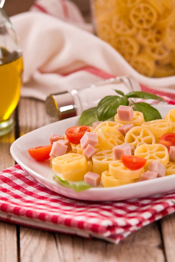 Ruote Pasta with Tomato and Ham. Stock Photo - Image of herb, condiment ...