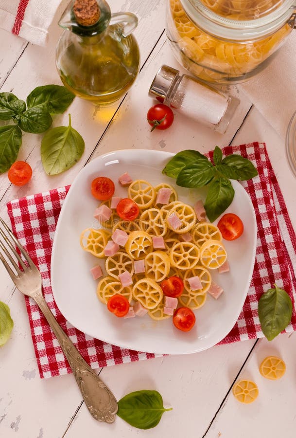 Ruote Pasta with Tomato and Ham. Stock Photo - Image of dietary, green ...