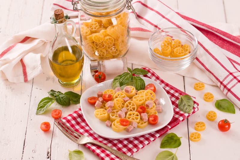 Ruote Pasta with Tomato and Ham. Stock Photo - Image of gourmet ...