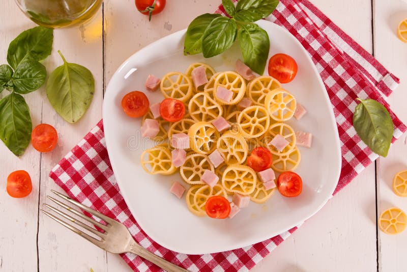 Ruote Pasta with Tomato and Ham. Stock Photo - Image of eating, health ...