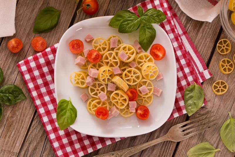 Ruote Pasta with Tomato and Ham. Stock Photo - Image of freshness ...
