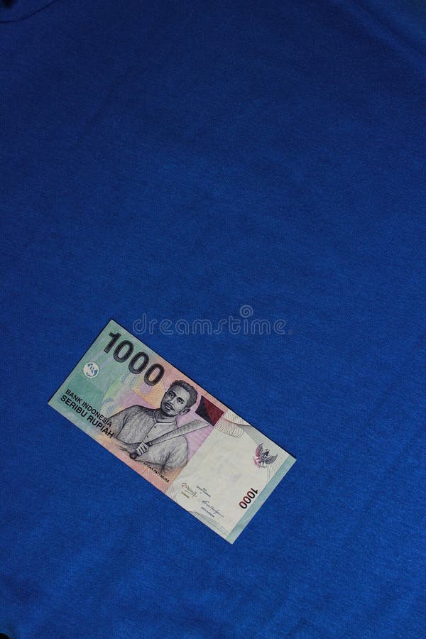 Rupiah currency Rp. 1000 stock image. Image of area - 261430707