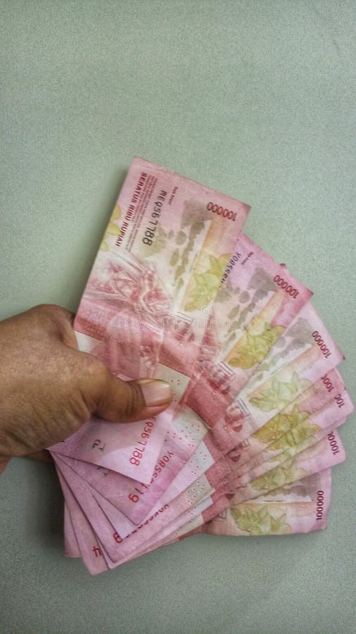 Rupiah Currency, 100.000 Rupiahs, Background Grey Colour Stock Photo ...