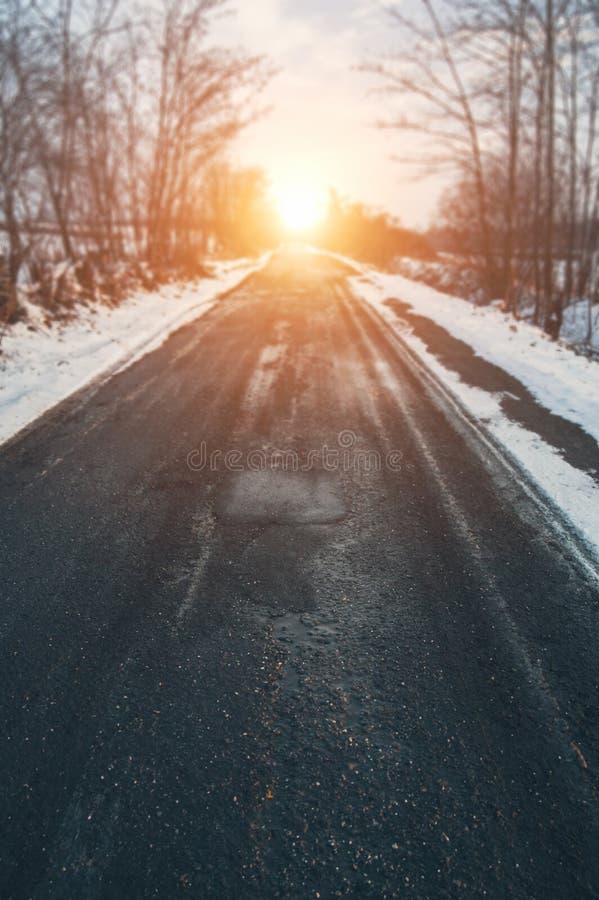 Rural Asphalt Road with Snow in Winter Stock Photo - Image of ...