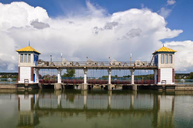 Rural dam with two towers stock photo. Image of summer - 10659000