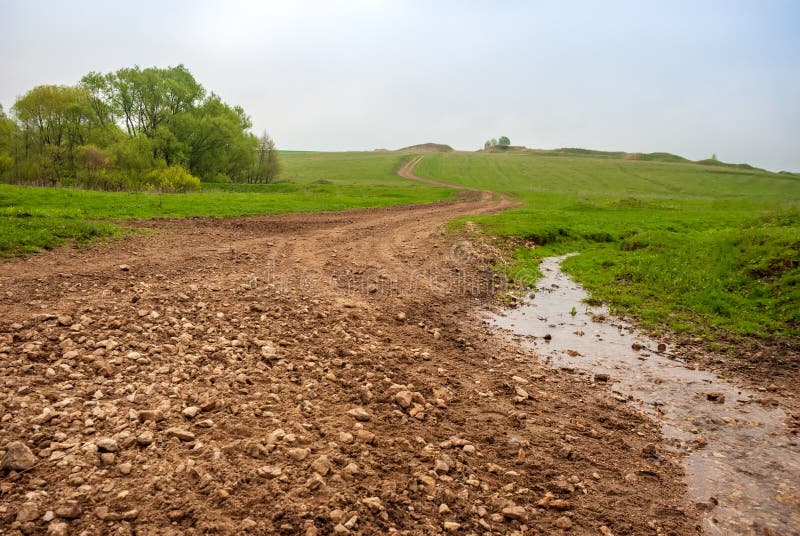 Rural Dirt Road in Rural Areas. Green Fields, Trees and a Small River ...