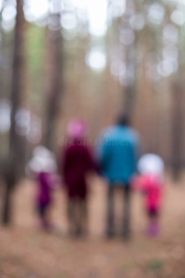 Rural Family In Autumn Forest. Blur Background Stock Photo - Image of ...
