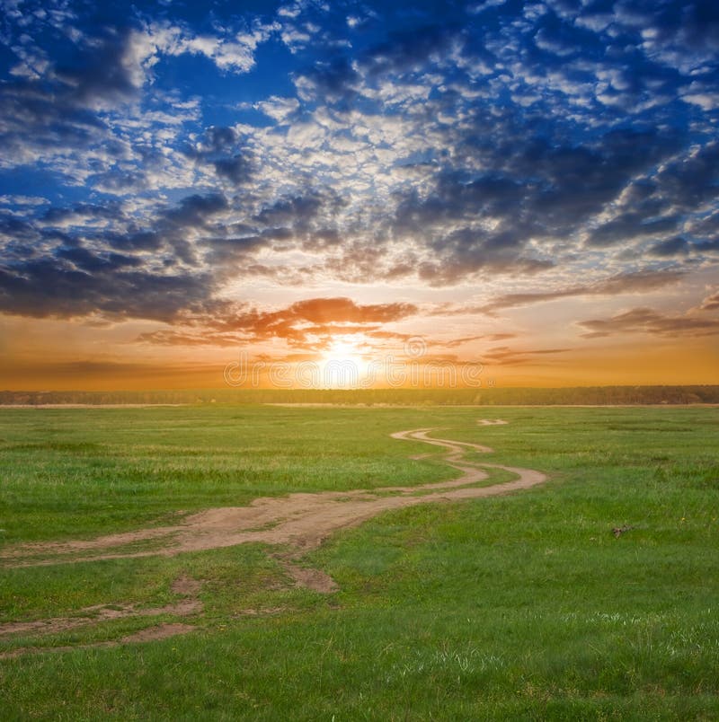 Rural Field with Ground Road at the Dramatic Sunset Stock Image - Image ...
