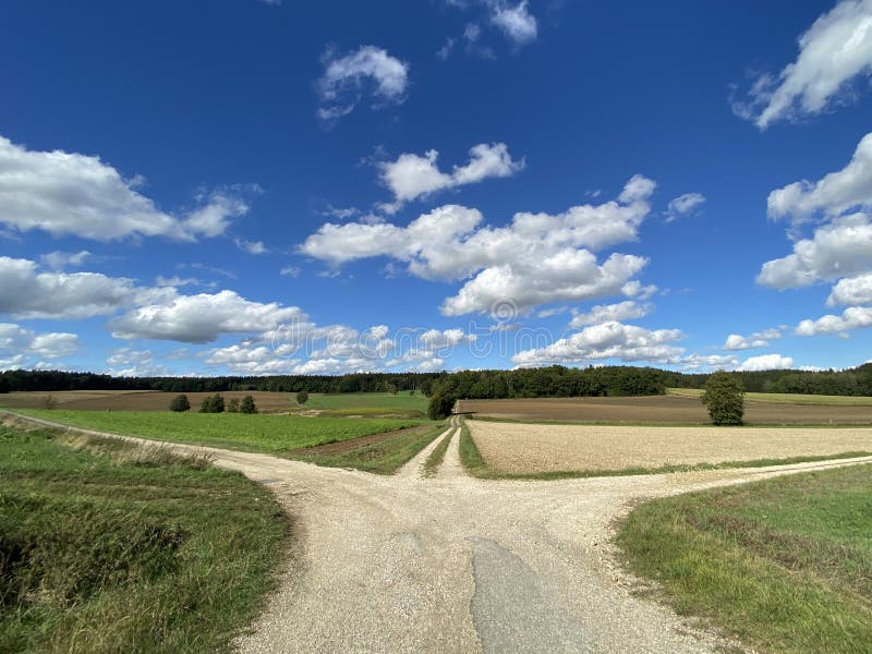Rural Forked Roads Under Blue Sky Stock Photo - Image of decision ...