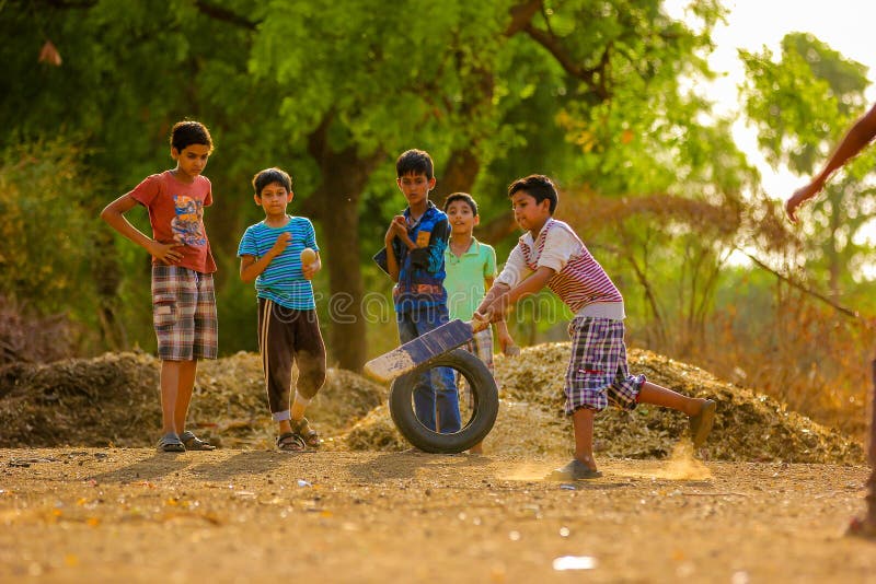 Rural Indian Child Playing Cricket Editorial Photography - Image of ...