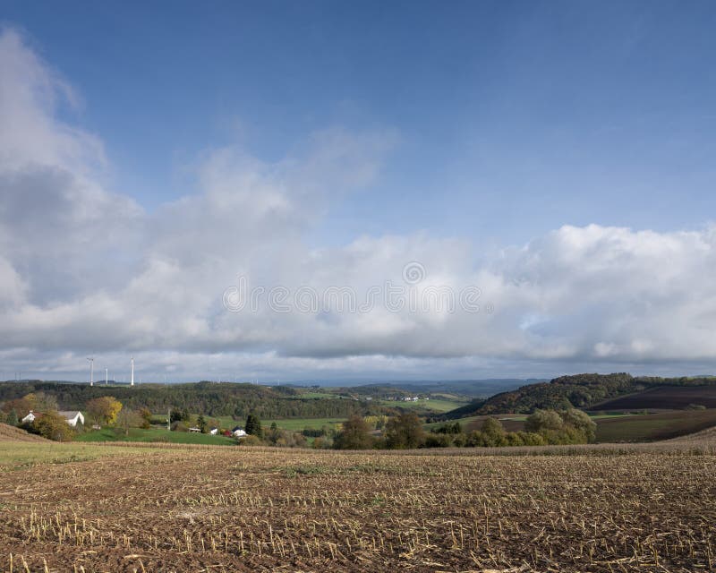 Rural Landscape with Colorful Forest in German Eifel Under Cloudy Sky ...