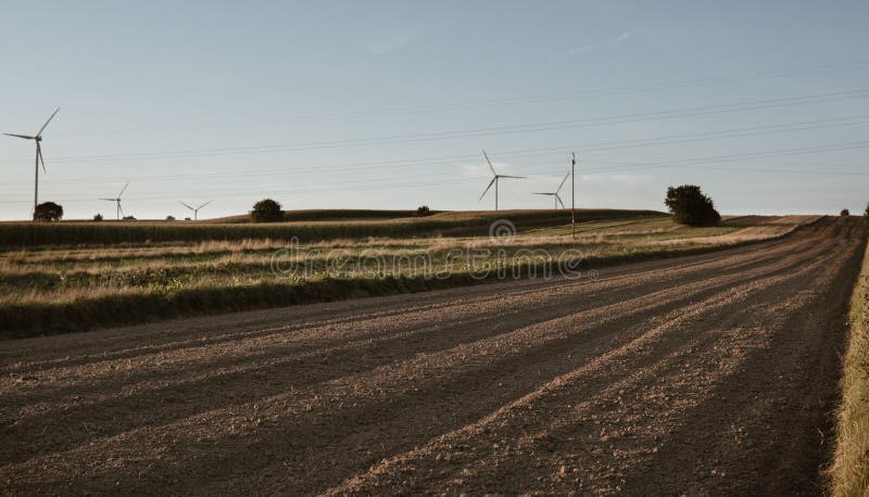Rural Landscape with Empty Fields and Wind Turbines Stock Image - Image ...