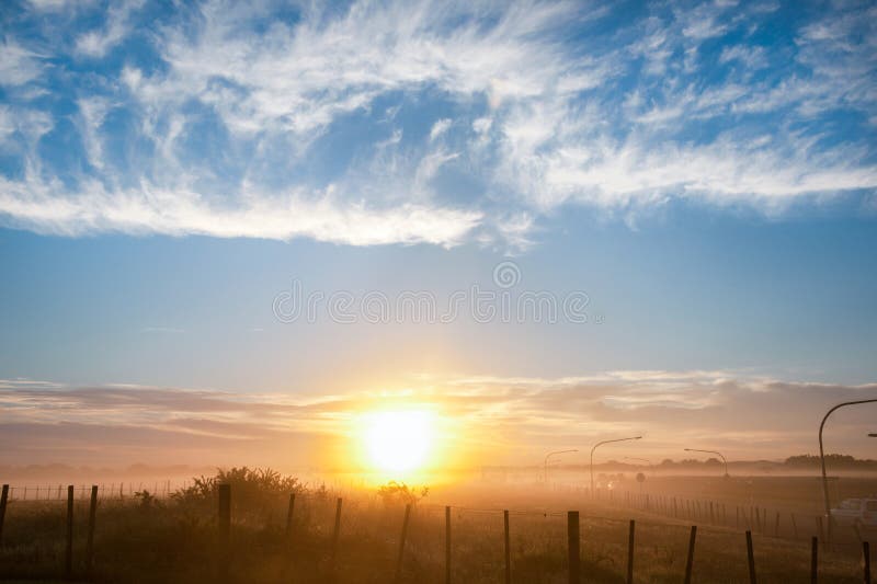 Rural Mist As Sun Illuminates Fields Stock Image - Image of fence ...