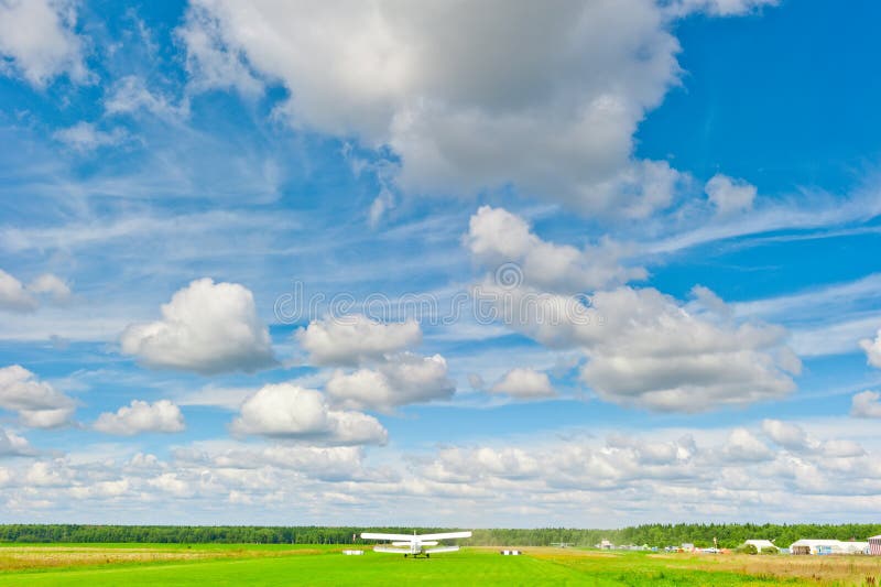 Rural Plane on the Runway in Field Stock Image - Image of lawn ...